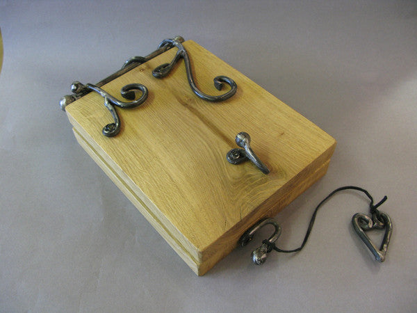 Maxine Hunt - Wood & Forged Iron Furniture & Giftware – Obsidian Art