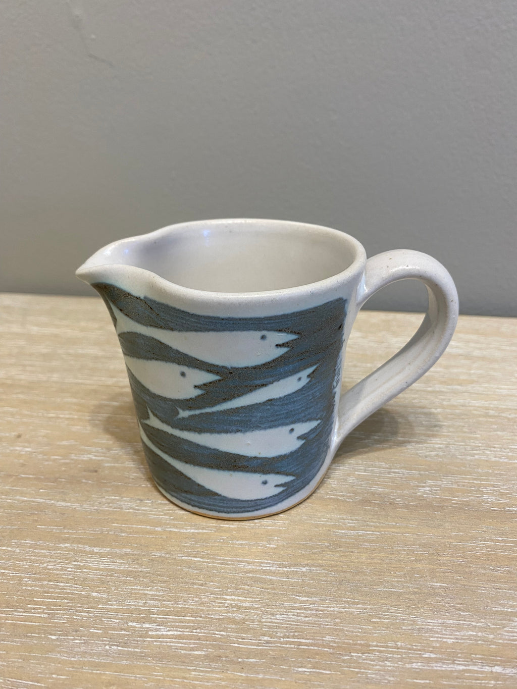 Pottery Cream Jug with Fish Design by Neil Tregear – Obsidian Art