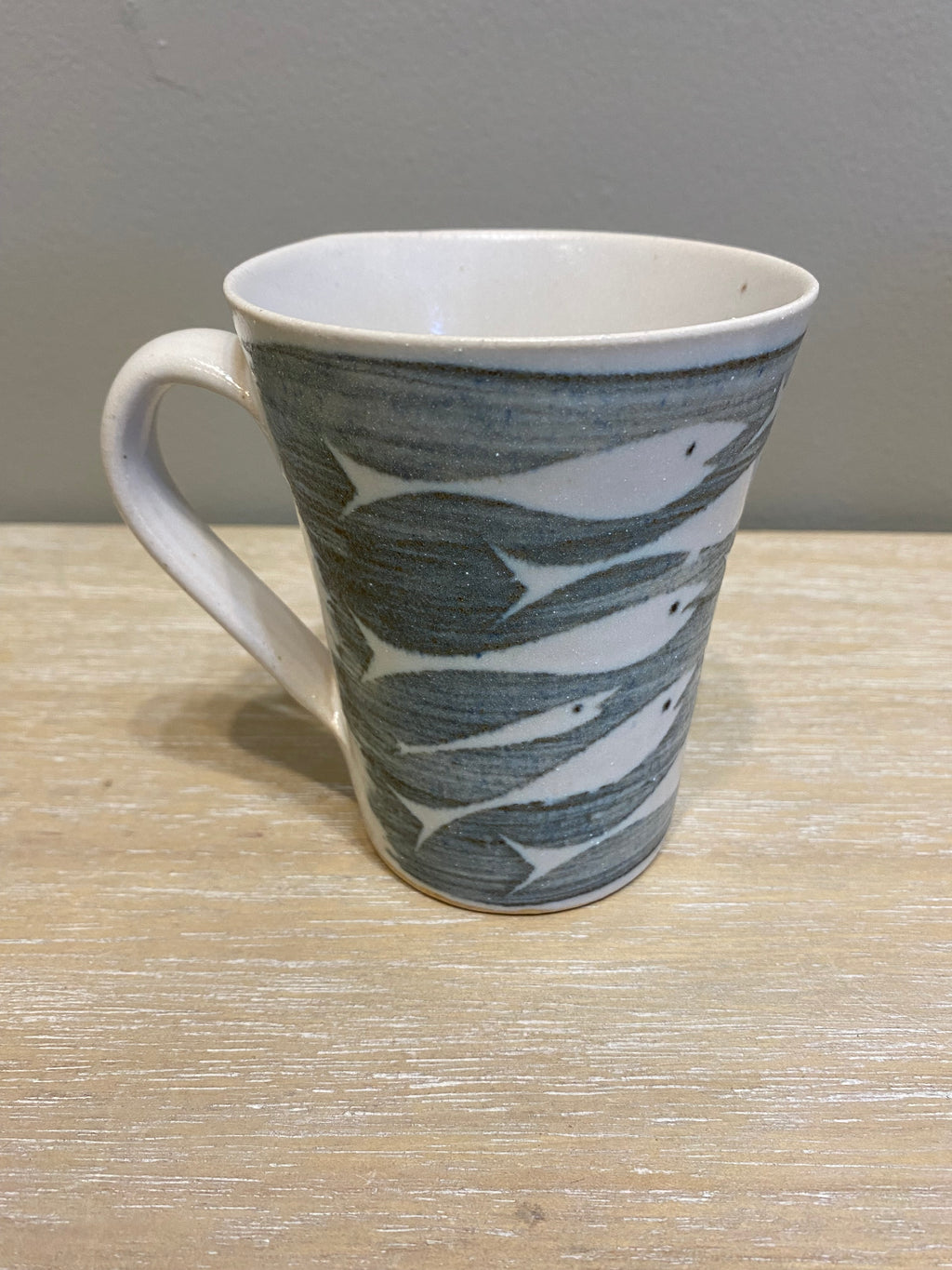 Fish Design Pottery Mug by Neil Tregear – Obsidian Art